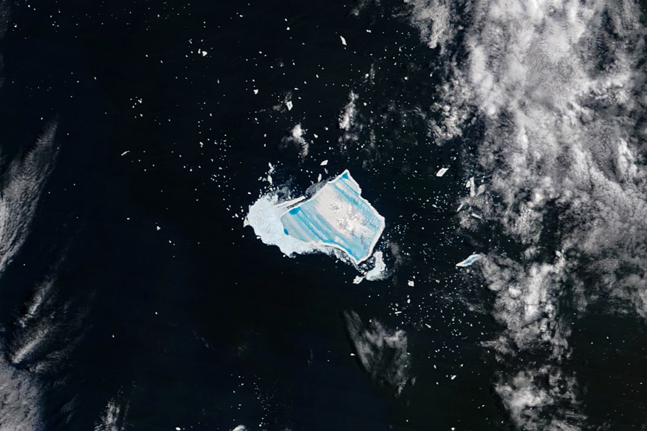 Meltwater Turns Iceberg A-23A Blue - NASA Science
