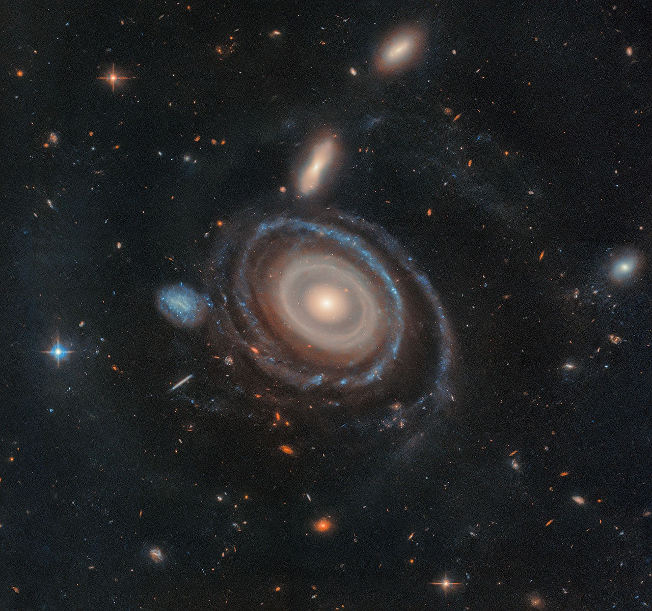 Straight Shot: Hubble Investigates Galaxy with Nine Rings - NASA Science
