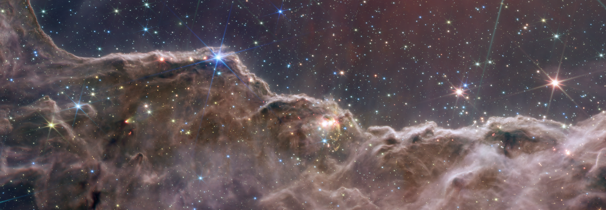 “Cosmic Cliffs” in the Carina Nebula (NIRCam and MIRI Composite Image) - NASA Science