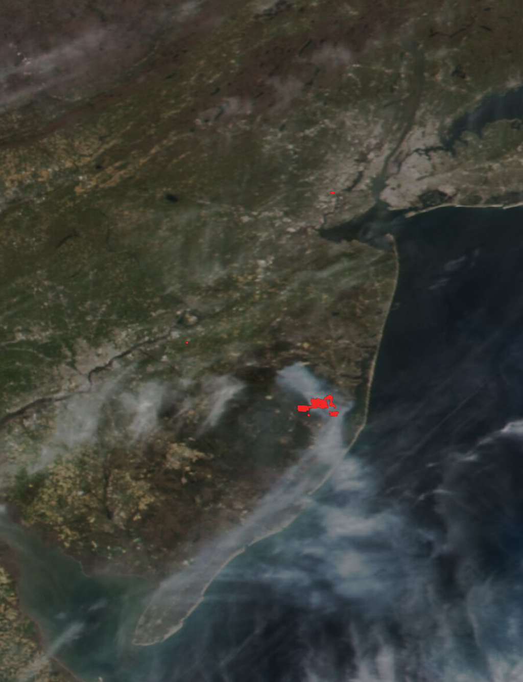 An image from a satellite in Earth orbit above the state of New Jersey with false color red dots showing the location of fires.