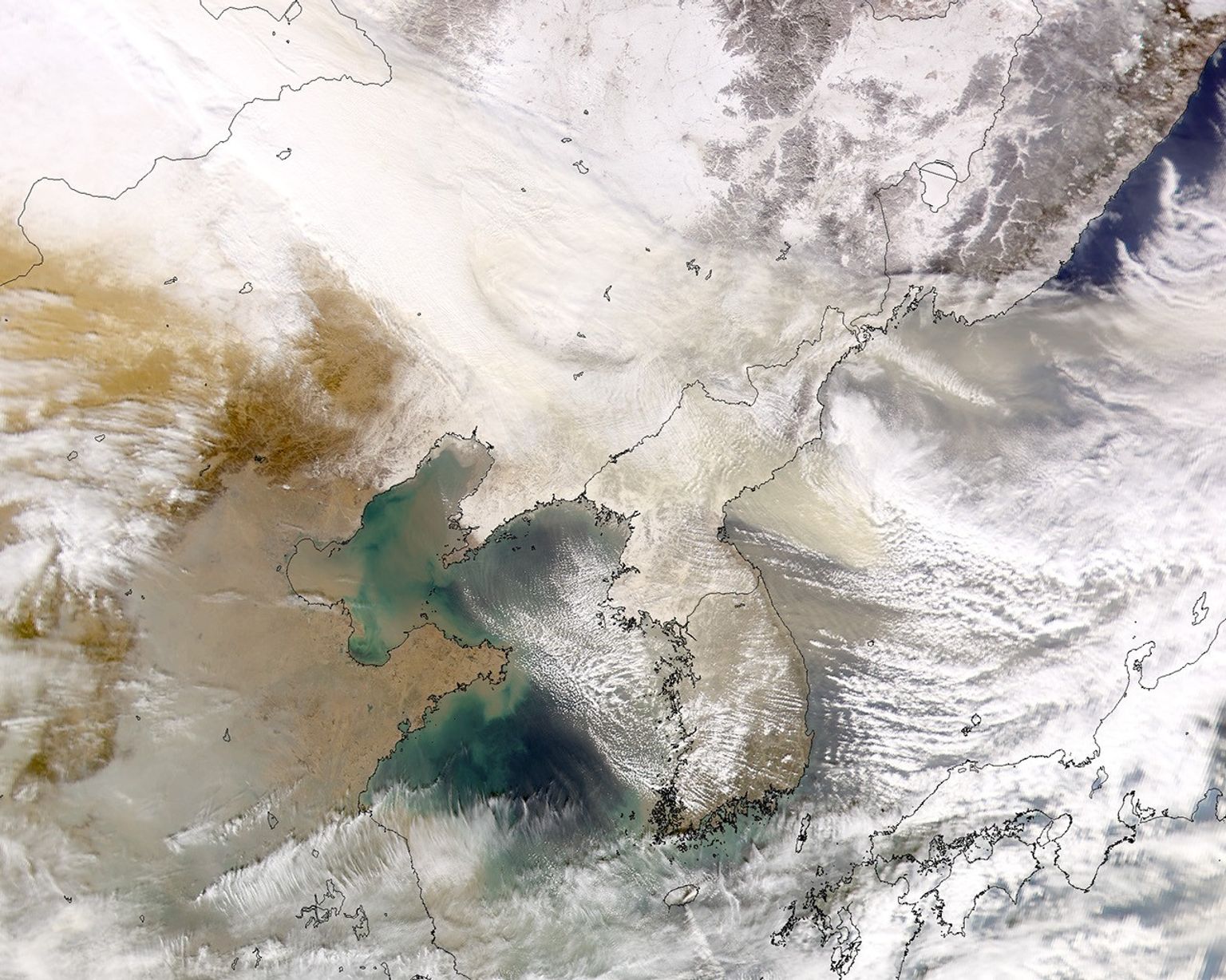 Snow and Dust over Inner Mongolia - NASA Science