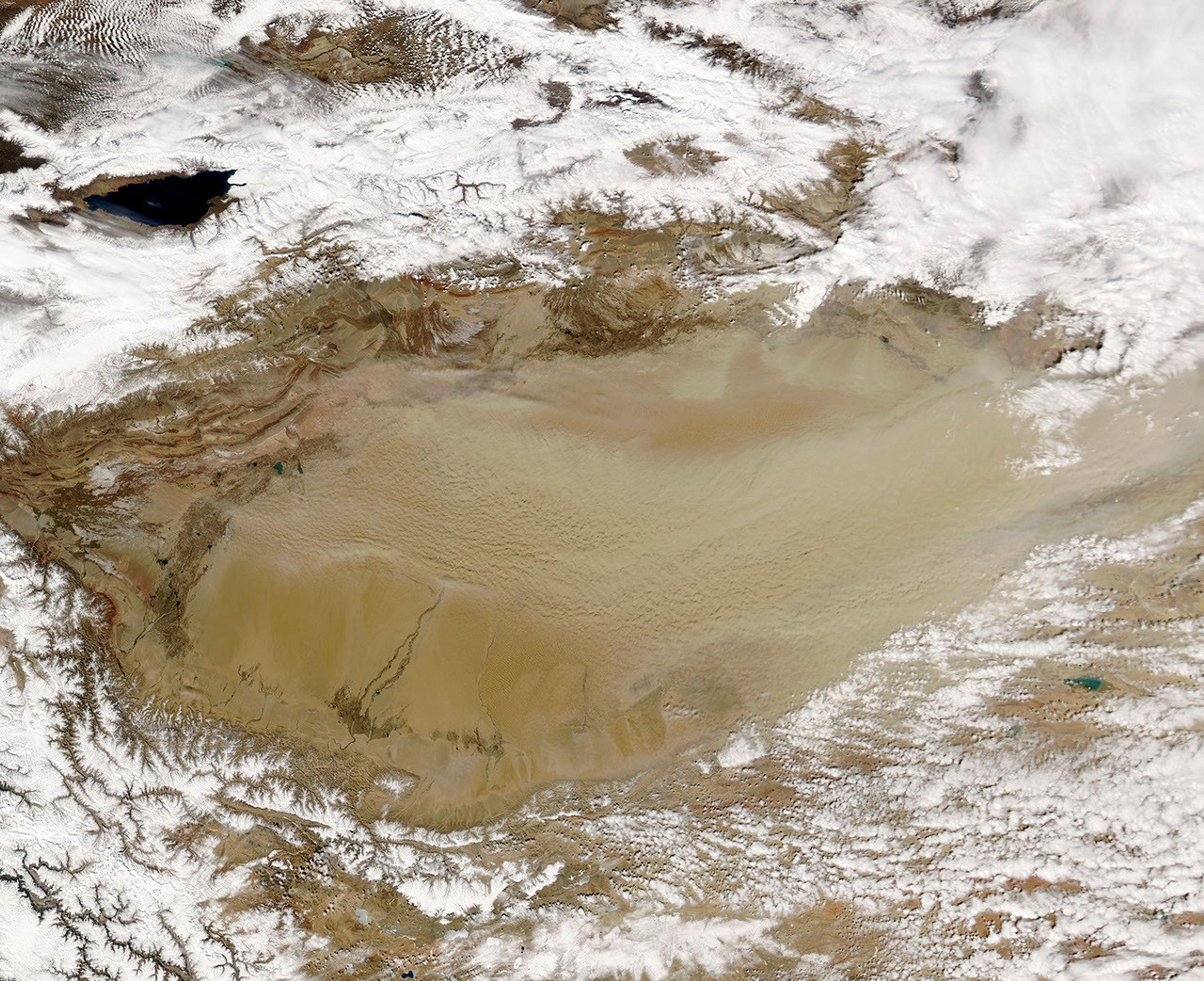 Dust over the Tarim Basin - NASA Science