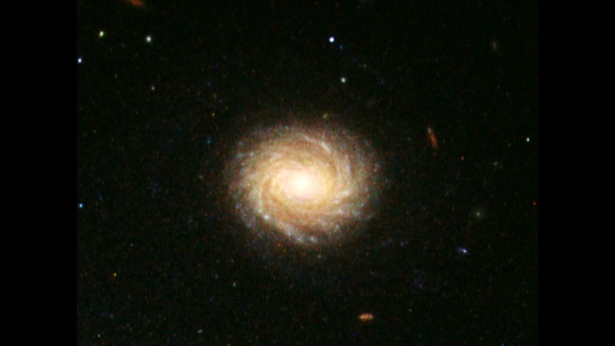Galaxy NGC 1427A Plunges Toward the Fornax Galaxy Cluster - NASA Science
