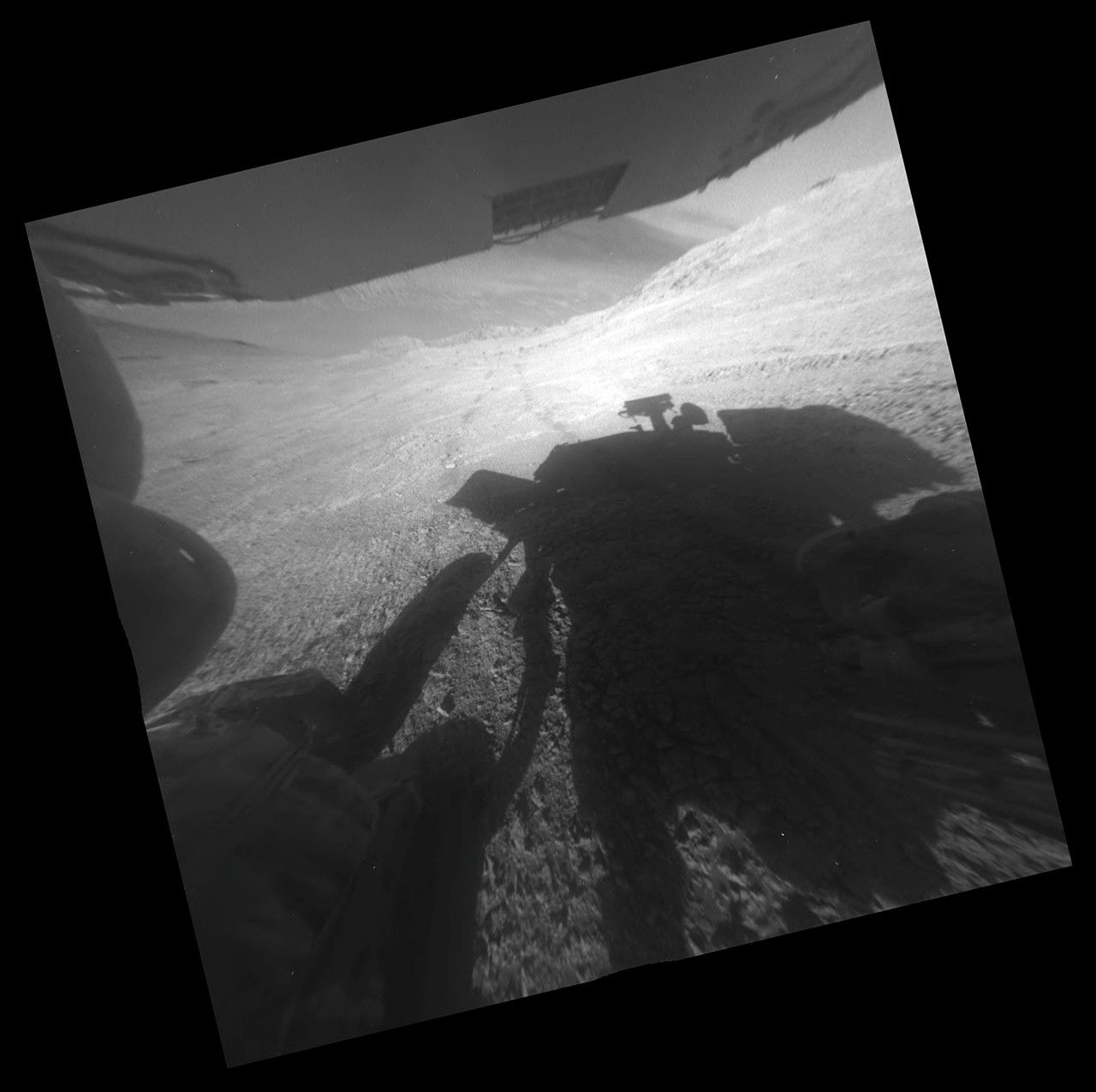 Opportunity's Shadow and Tracks on Martian Slope - NASA Science