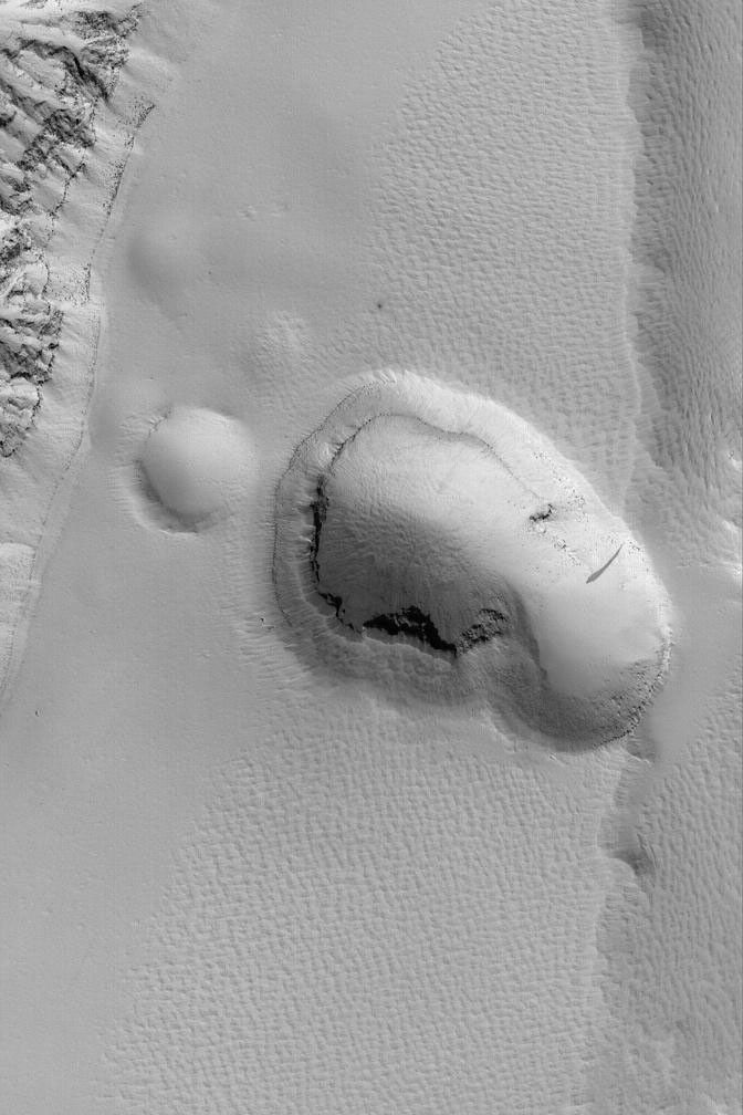 Dusty Collapse Pit - NASA Science