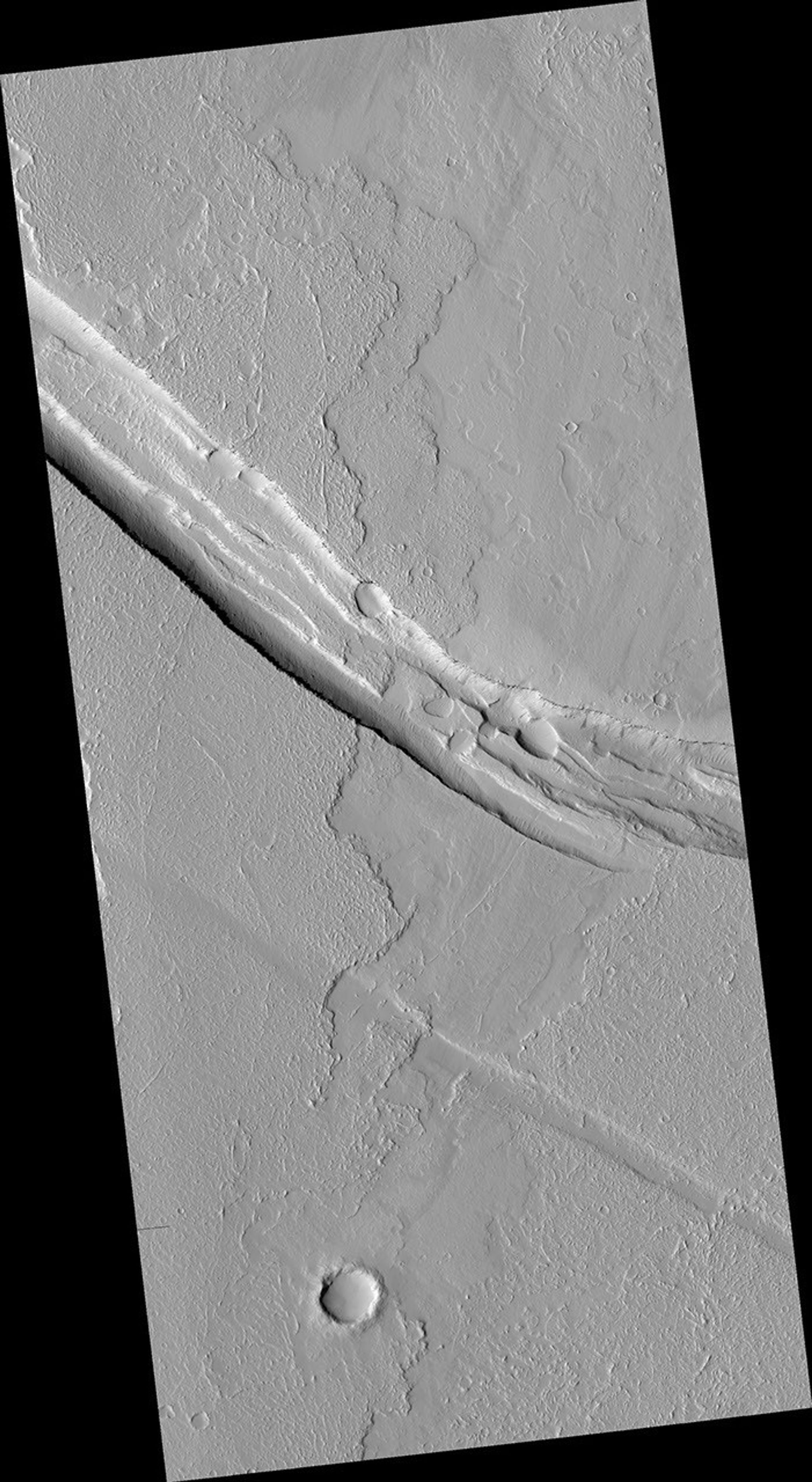 Graben Cutting Lava Flow in Tharsis - NASA Science